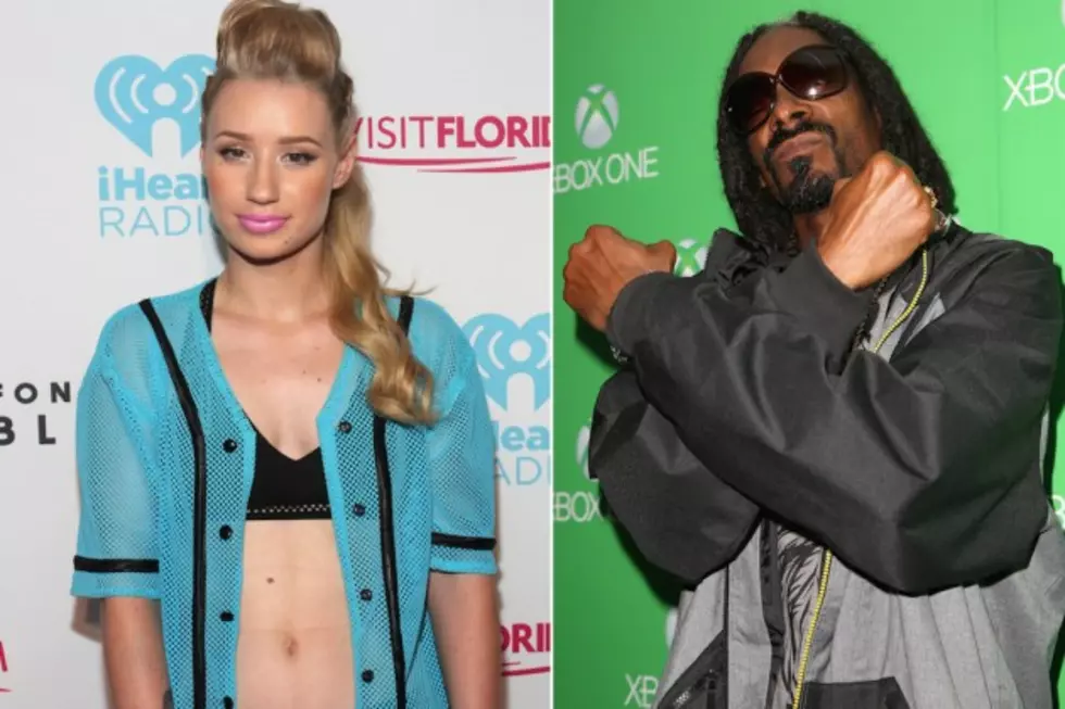 Iggy Azalea and Snoop Dogg Continue Their Feud on Social Media Iggy Azalea and Snoop Dogg Continue Their Feud on Social Media
